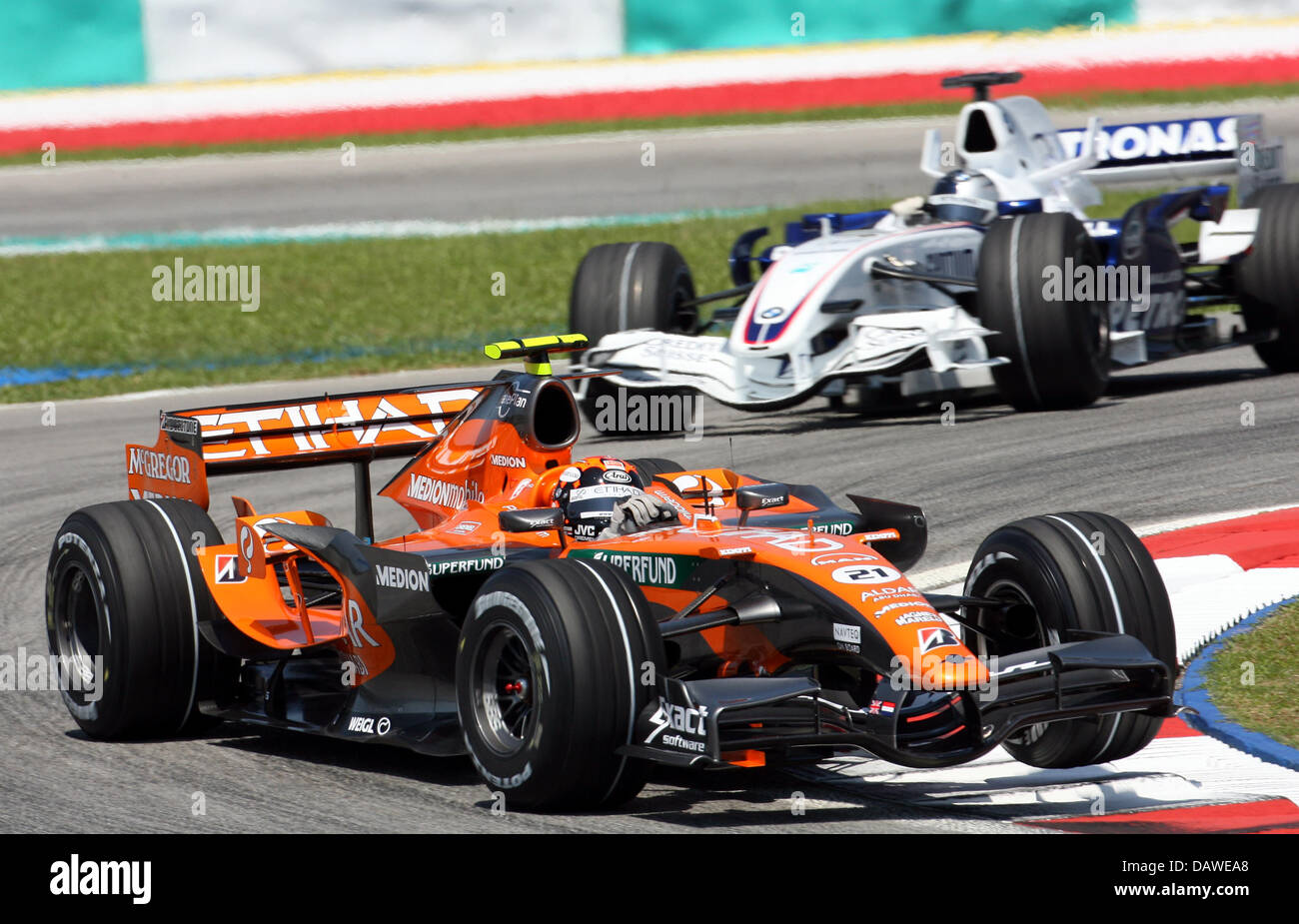 Dutch Formula One driver Christijan Albers (front) of Spyker is in ...