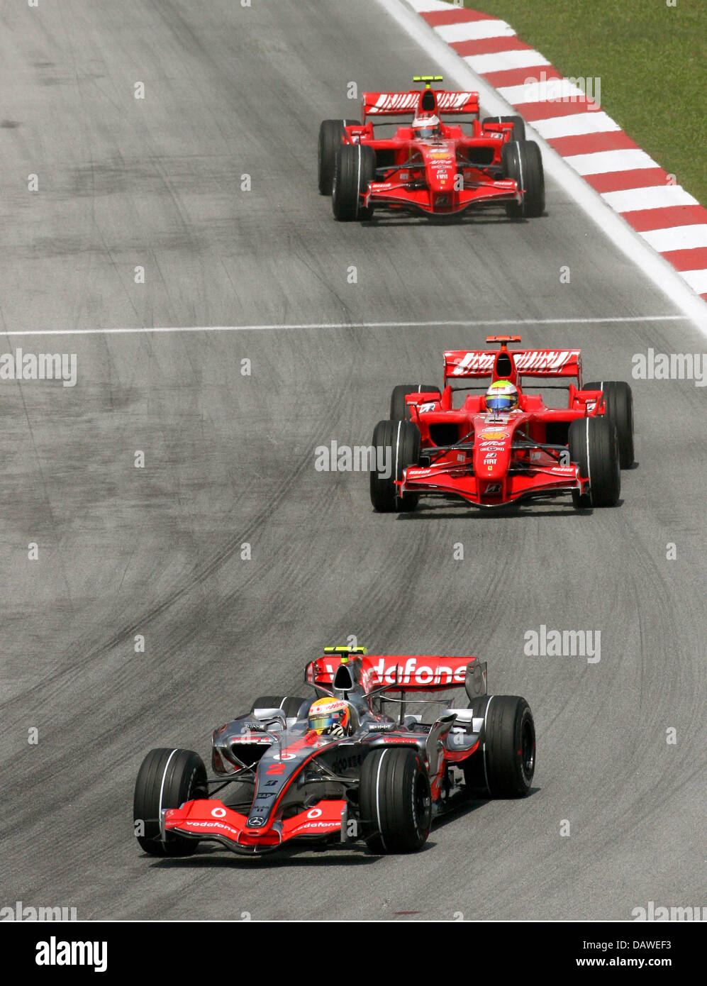 British Formula 1 pilot Lewis Hamilton (bottom) of McLaren Mercedes ...