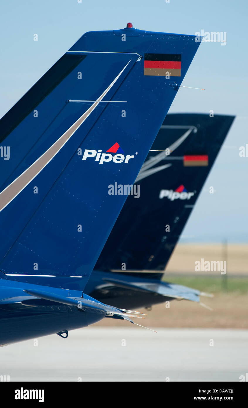 "Piper" is written on the tail of two aircraft outside of the new Piper ...