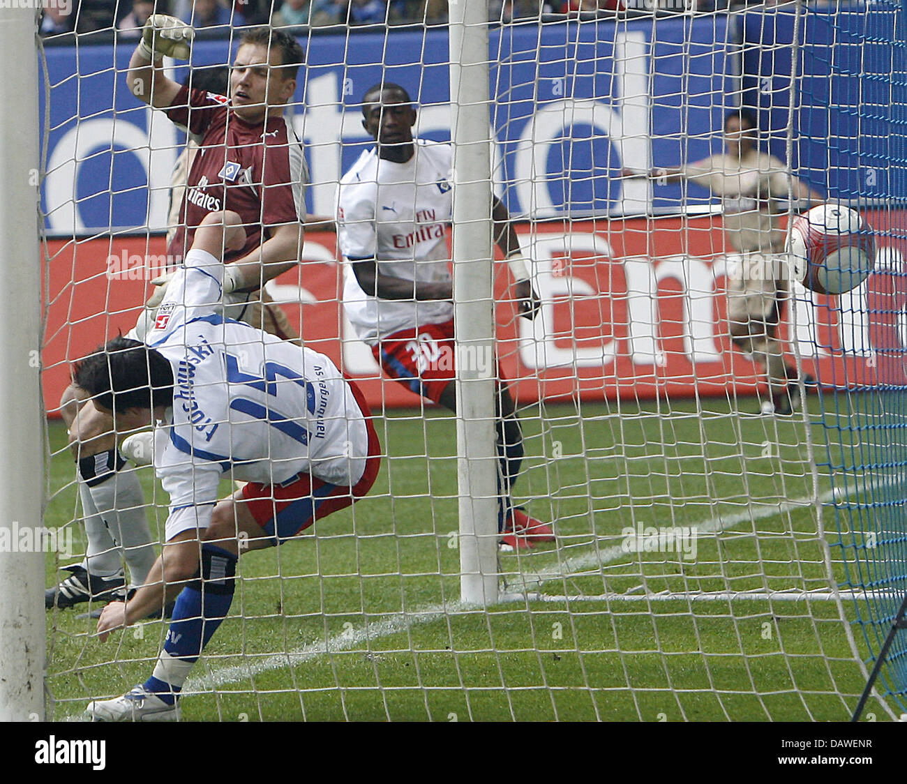 Hamburg's Piotr Trochowski (L-R), goalie Frank Rost and Collin Benjamin ...