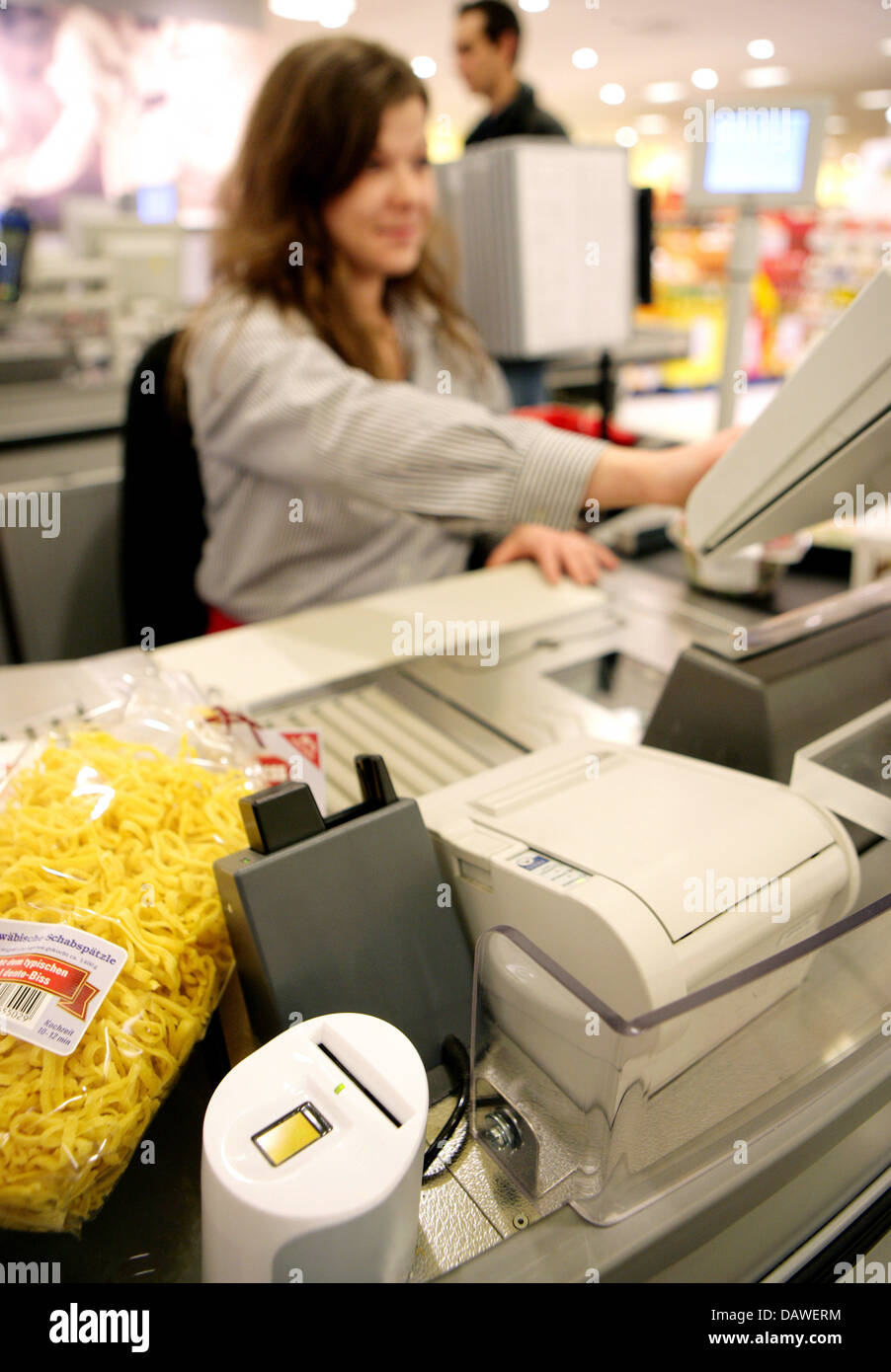 The picture shows the finger tip scanner at a cashier of a Rewe ...