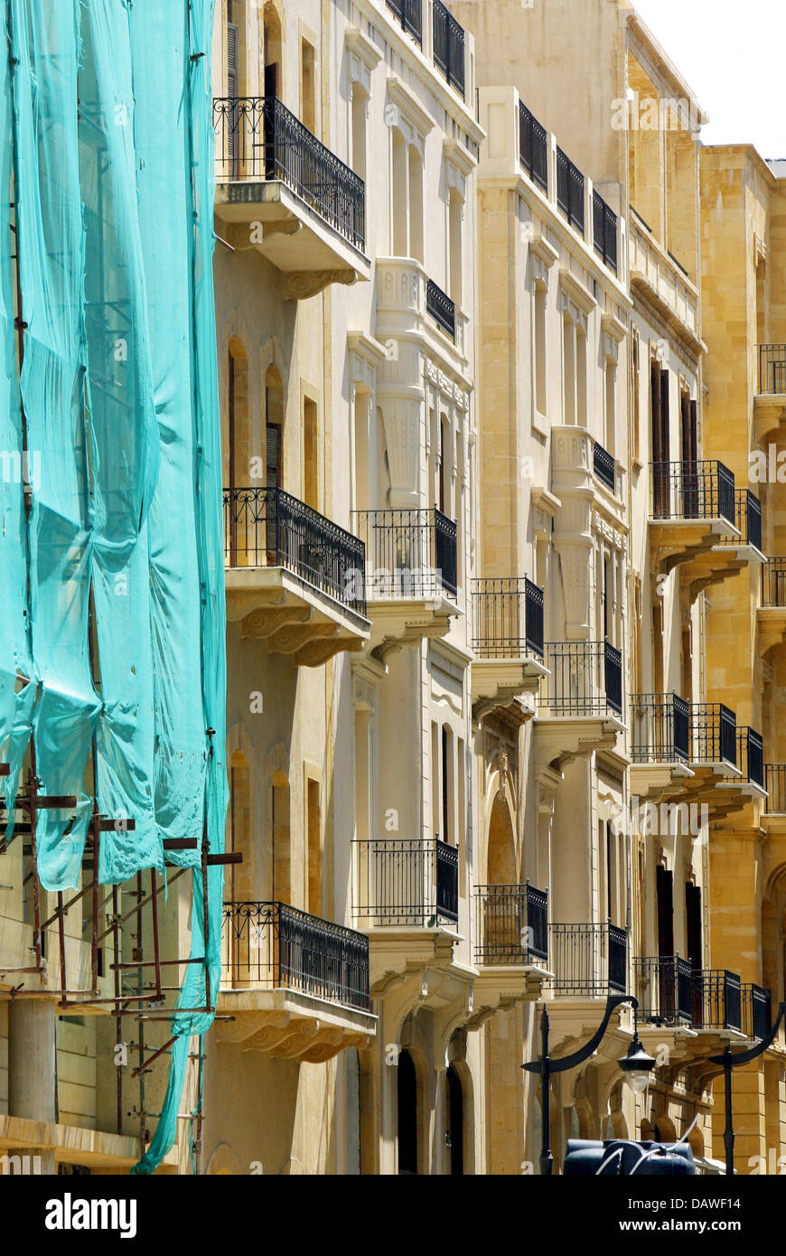 The photo shows refurbished old residential buildings in the city ...