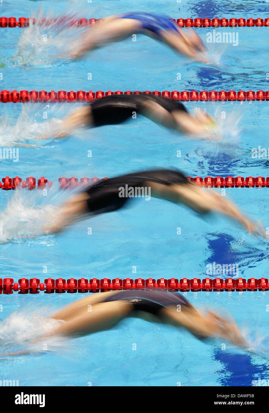 Swimmers start at the women's 200m backstroke preliminaries during the ...
