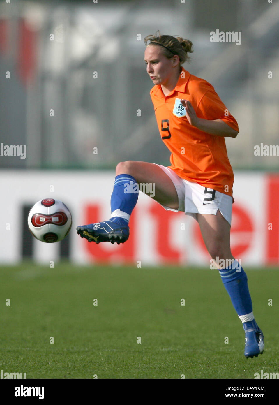 Dutch forward Manon Melis plays the ball during the qualifying game for ...