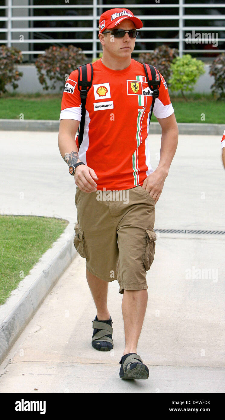 Finnish Formula 1 driver Kimi Raikkonen of Scuderia Ferrari arrives to ...
