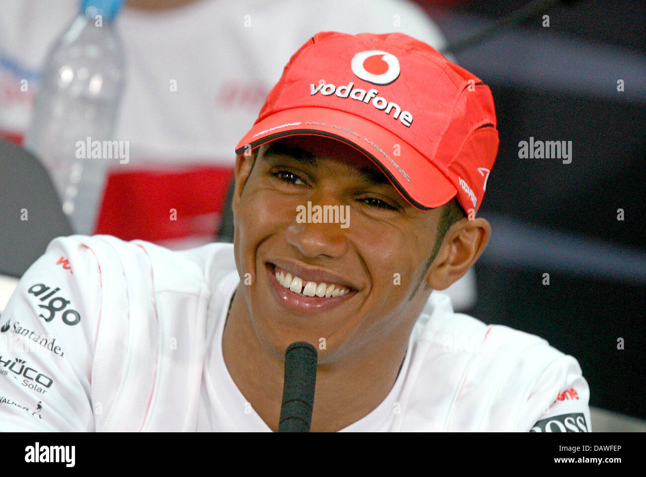 British Formula One rookie Lewis Hamilton of McLaren Mercedes smiles at ...