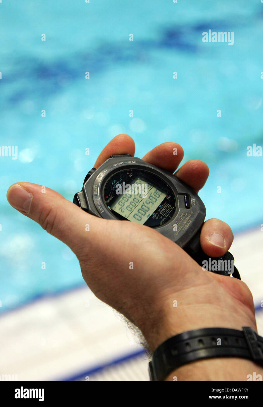 A stopwatch takes the time at the German Championships in Berlin ...