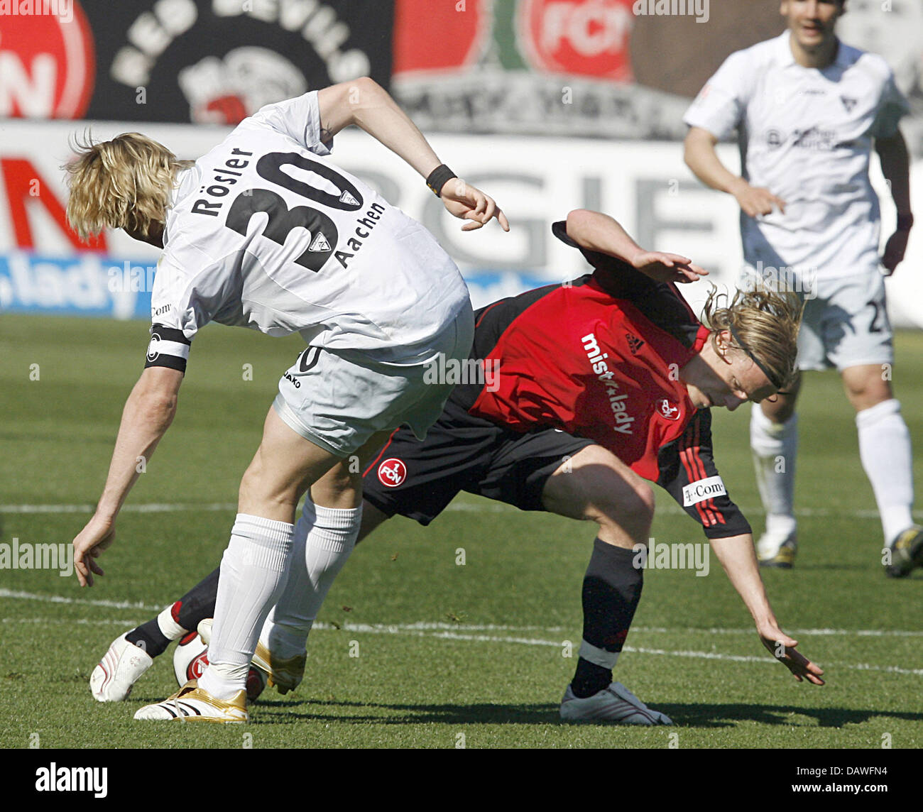 Marco Engelhardt (R) of Nuremberg and Aachen's Sascha Roesler vie for ...
