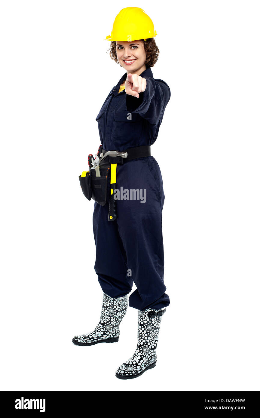 Pretty female worker pointing you out Stock Photo - Alamy