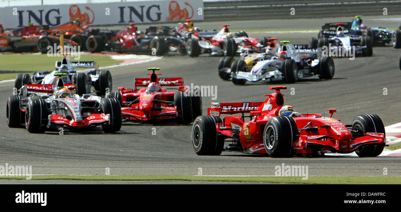 Brazilian Formula One driver Felipe Massa (R) of Scuderia Ferrari Team ...