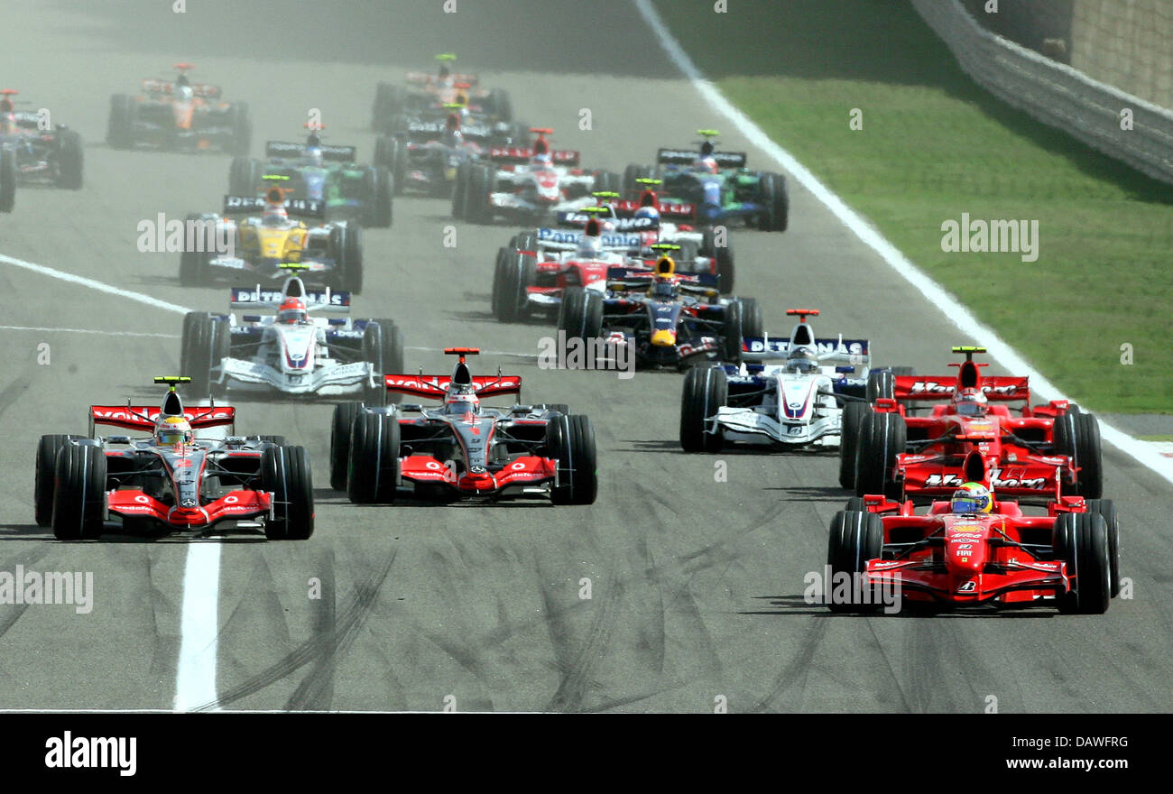 Brazilian Formula One driver Felipe Massa (R) of Scuderia Ferrari Team ...