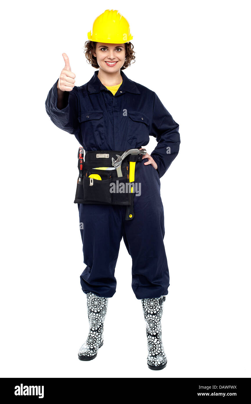 Pretty construction worker gesturing success Stock Photo - Alamy