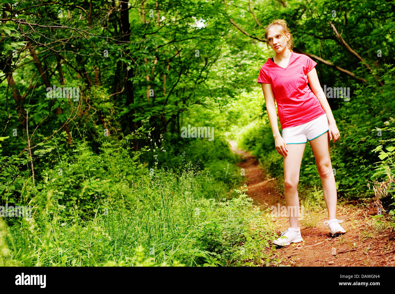 Woman In Red Running Stock Photo - Alamy