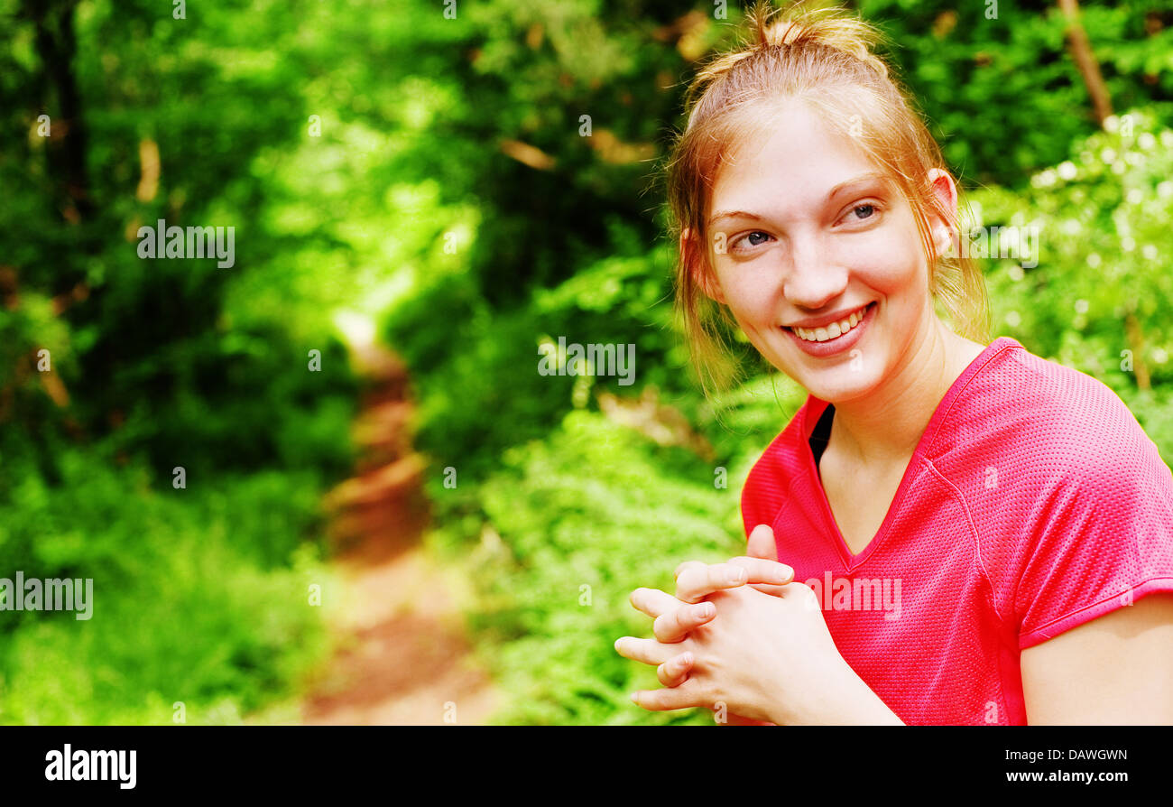 Woman In Red Running Stock Photo - Alamy