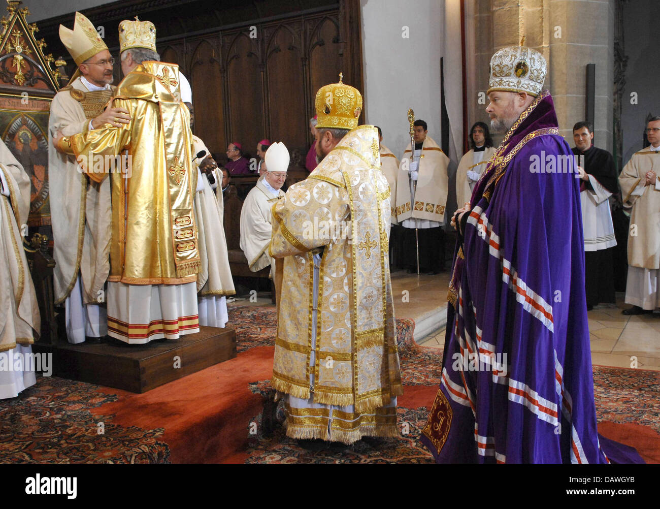 Orthodox clerics congratulate bishop Gregor Maria Hanke (L) after being ...