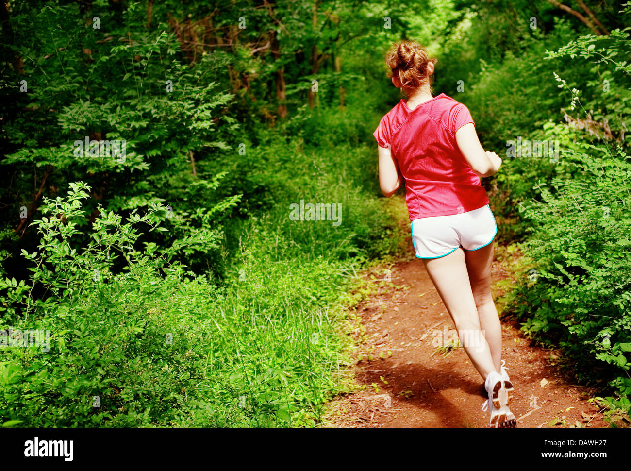 Woman In Red Running Stock Photo - Alamy