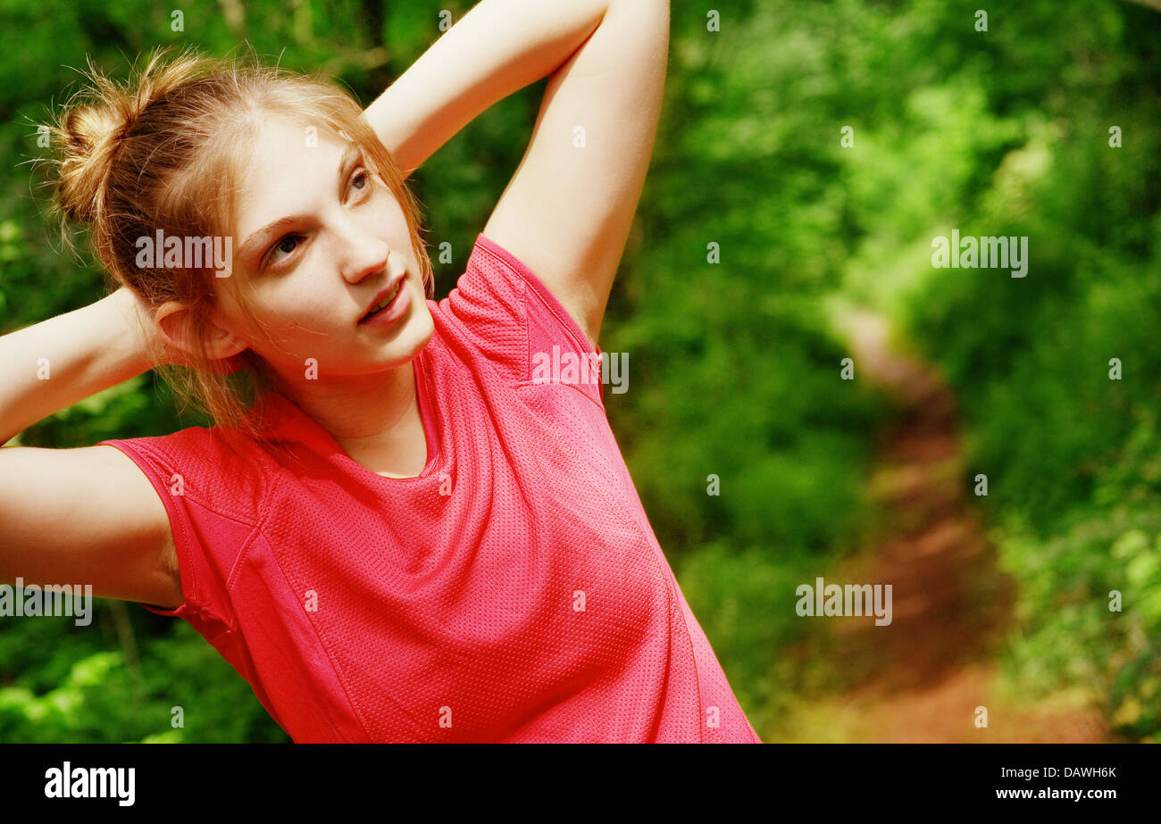 Woman In Red Running Stock Photo - Alamy