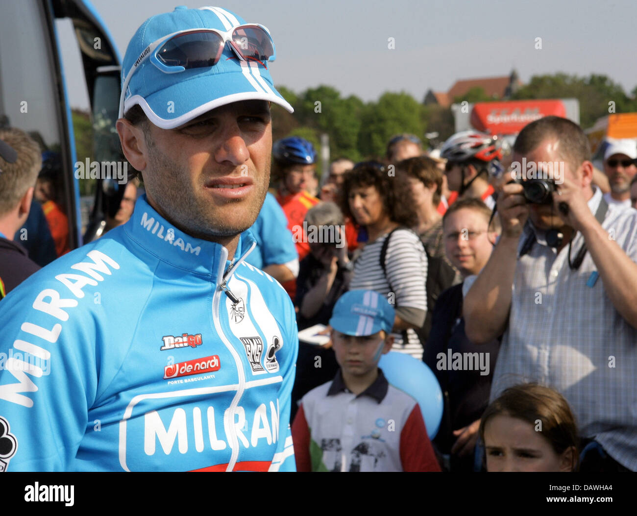 Italian winner Alessandro Petacchi (L) of team Milram is pictured after ...