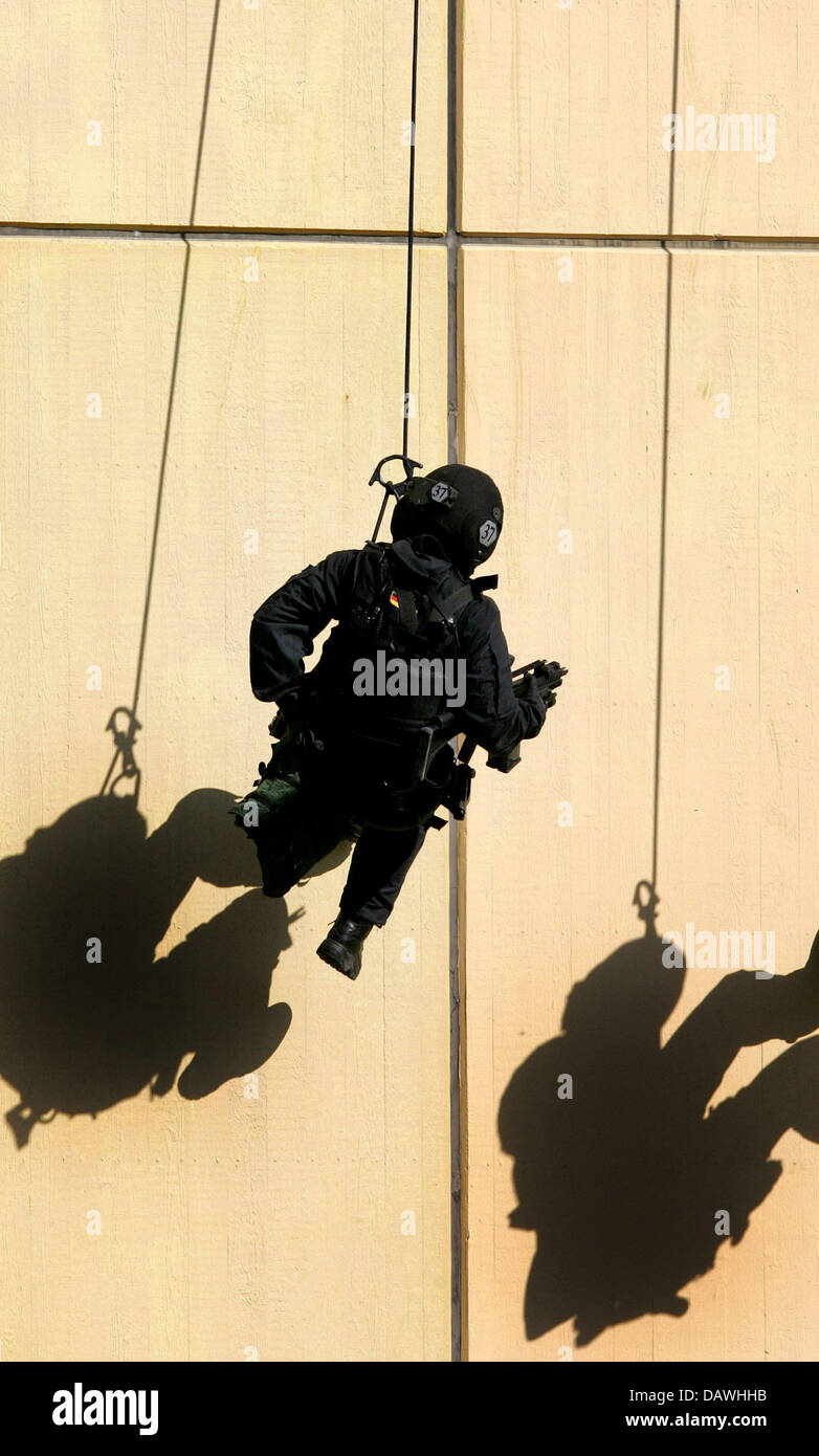 European police task force units are shown in action during a drill, in ...