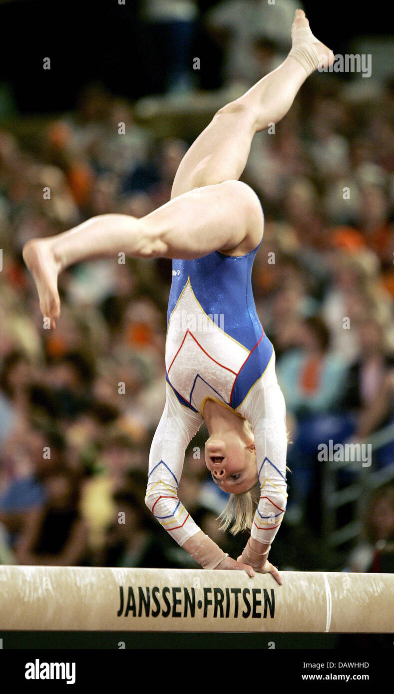 Romanian gymnast Sandra Izbasa demonstrates an exercise on the balance ...