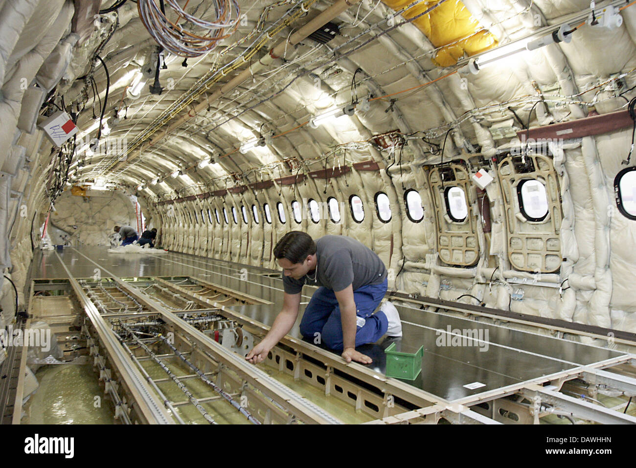 Airbus employees pictured working in the body of an Airbus A320 in ...