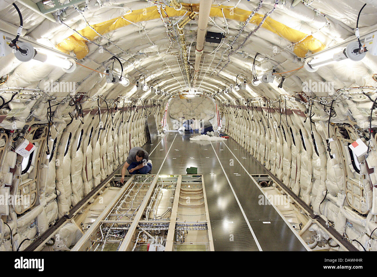 Airbus employees pictured working in the body of an Airbus A320 in ...
