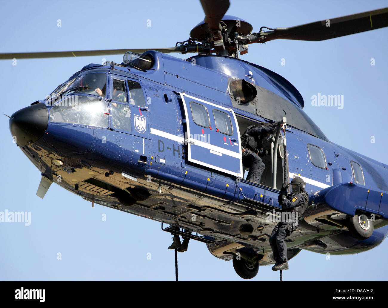 European police task force units are shown in action during a drill, in ...