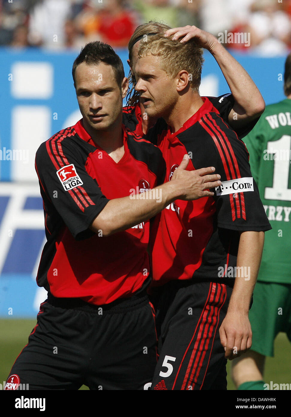 Nuremberg's Andreas Wolf (R) celebrates his 1:1 equaliser with his ...