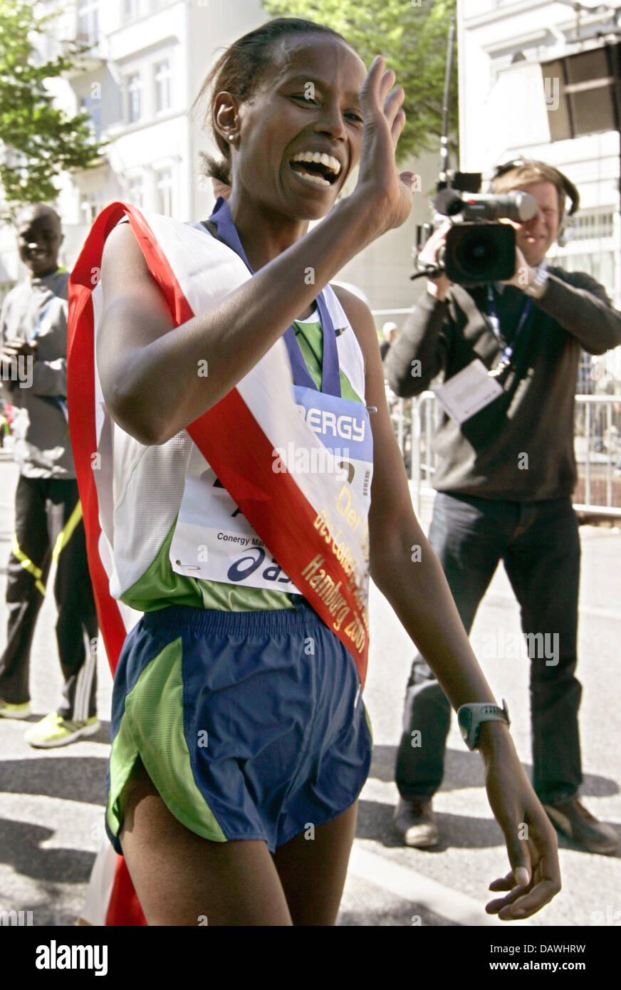 Ethiopian runner ayelech worku celebrates hi-res stock photography and ...