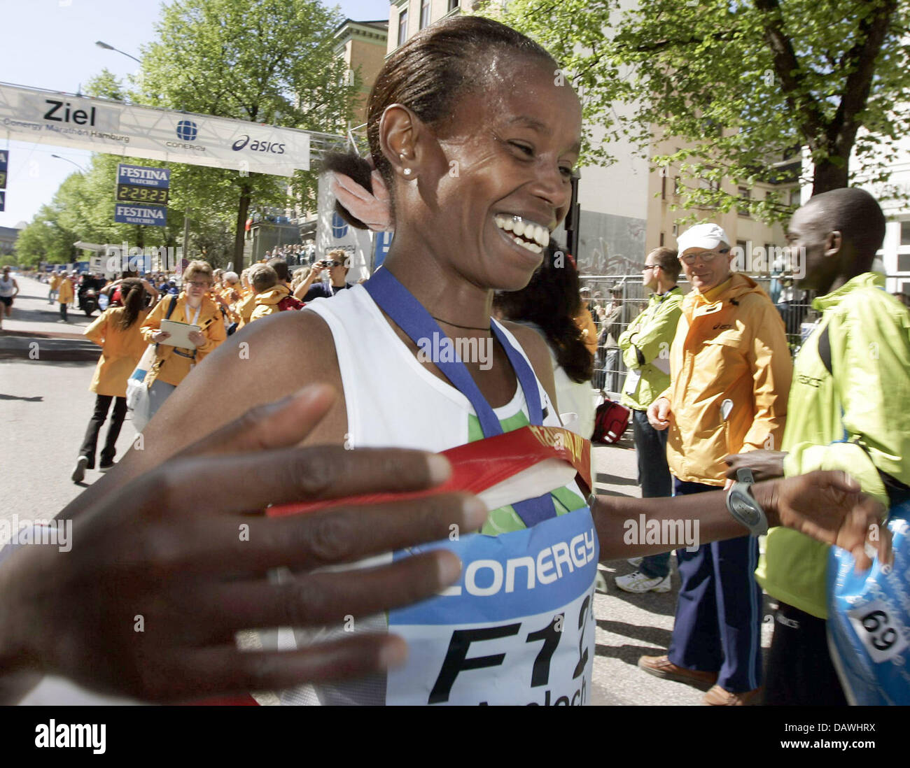 Ethiopian runner ayelech worku celebrates hi-res stock photography and ...