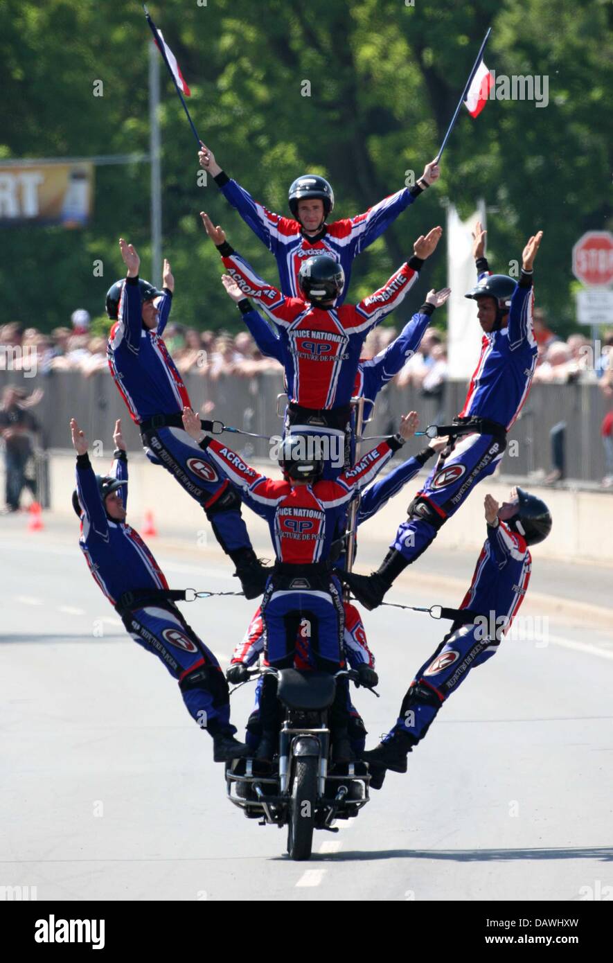 The motorbike acrobat group of the Parisian police performs at the 7th ...