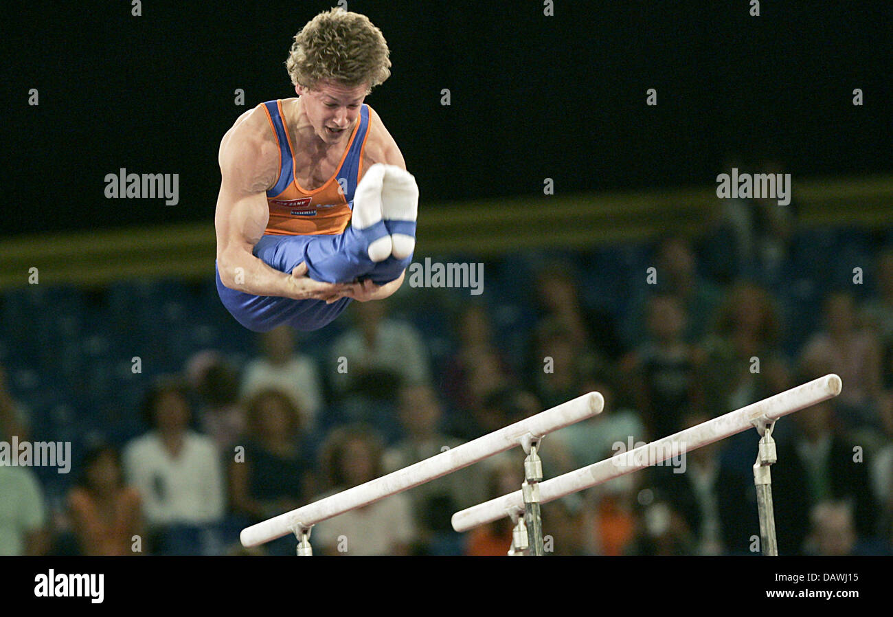 Dutch gymnast Epke Zonderland shown in action during the parallel bars ...