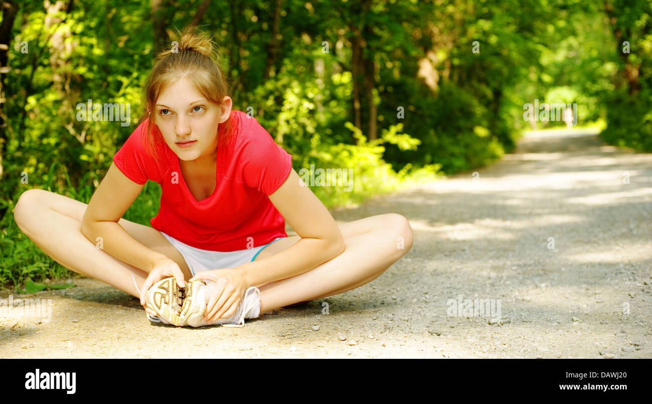 Woman In Red Running Stock Photo - Alamy
