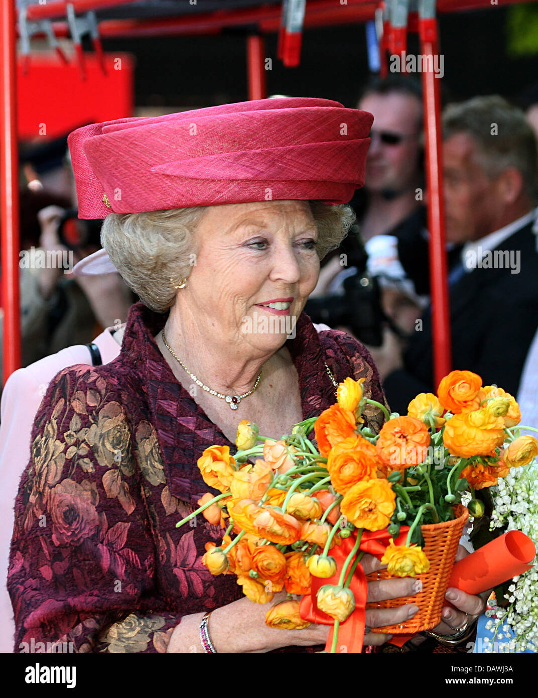 Dutch Queen Beatrix shown with a bunch of flowers during her 'Queen's ...