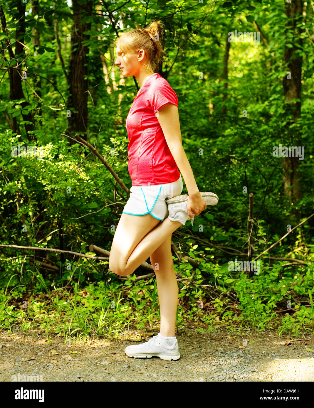 Woman In Red Running Stock Photo - Alamy