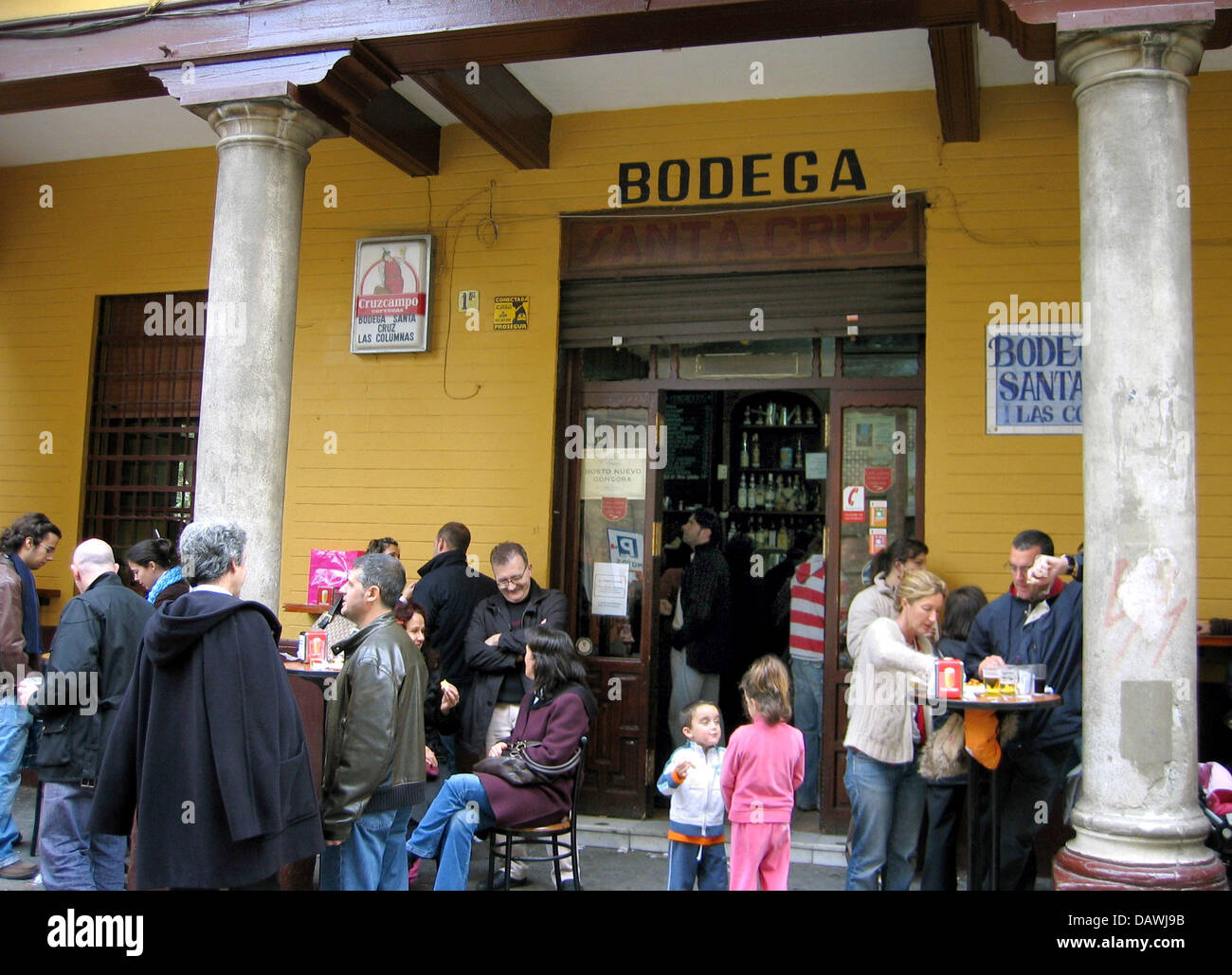 Customers are pictured in front of a bodega at the historic city centre ...