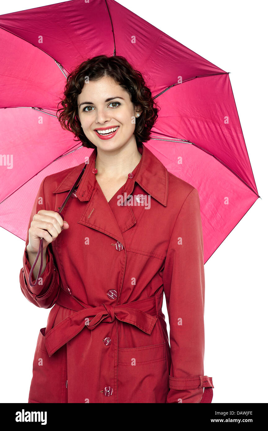 Fashionable young model posing with an umbrella Stock Photo - Alamy