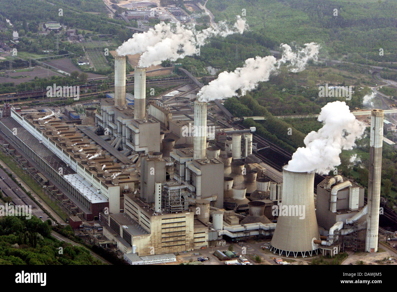 Smoke emerges from the cooling towers of the RWE brown coal-fired power ...