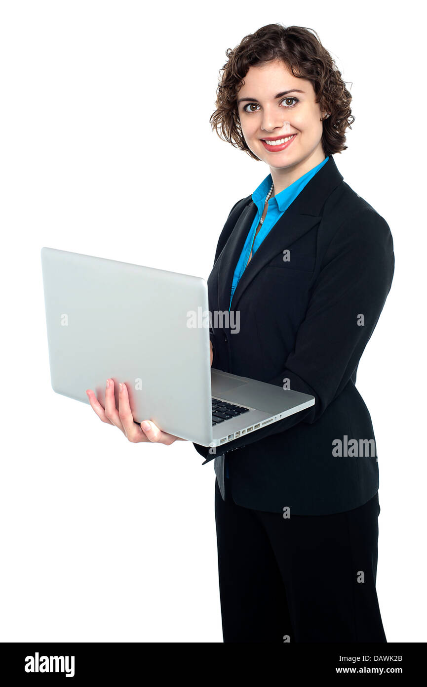 Female manager working on laptop Stock Photo - Alamy