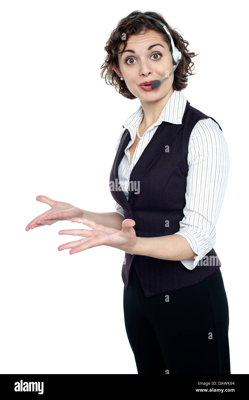 Amazed pretty young female customer care executive Stock Photo - Alamy