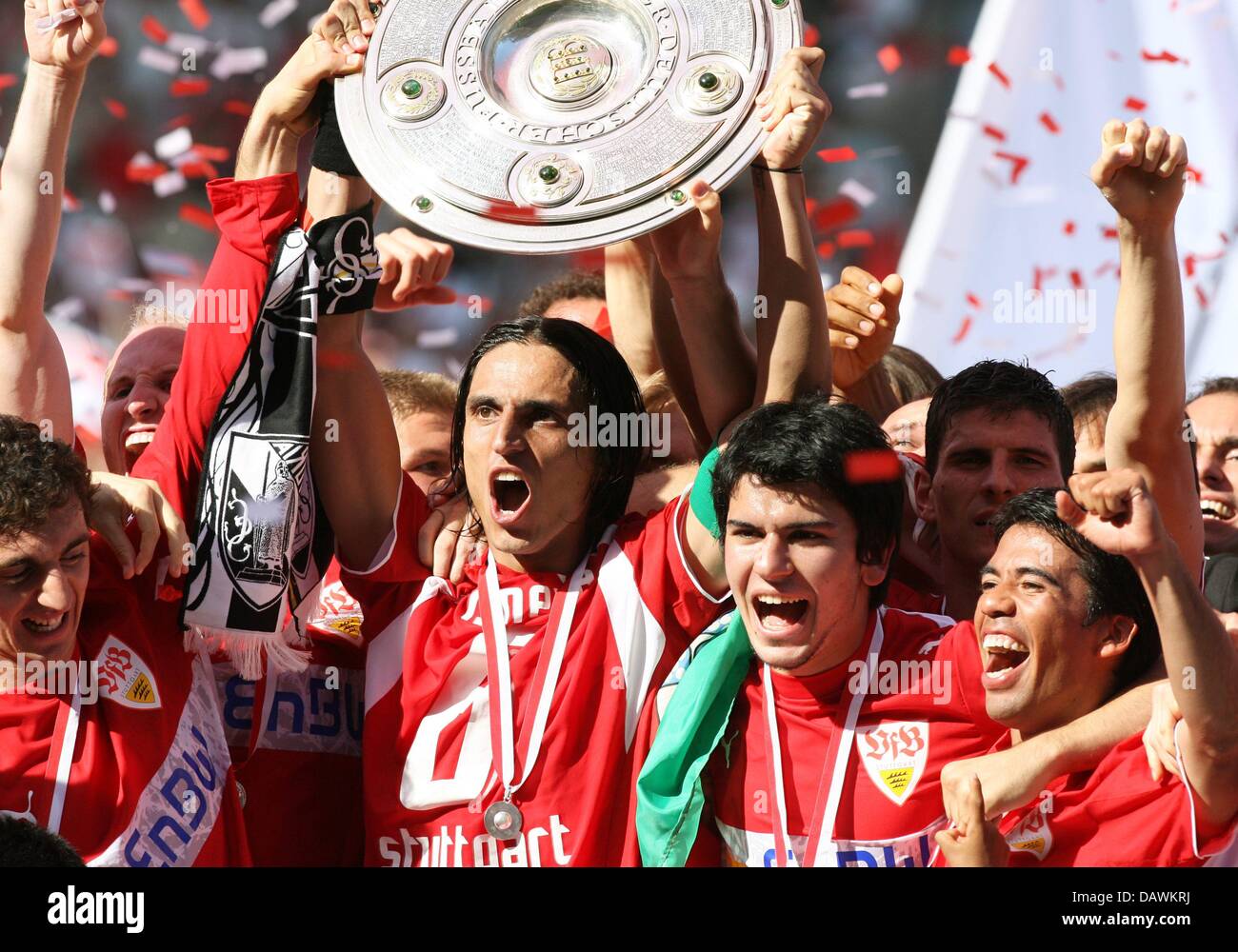 VfB Stuttgart team captain Fernando Meira (C) holds up the championship ...