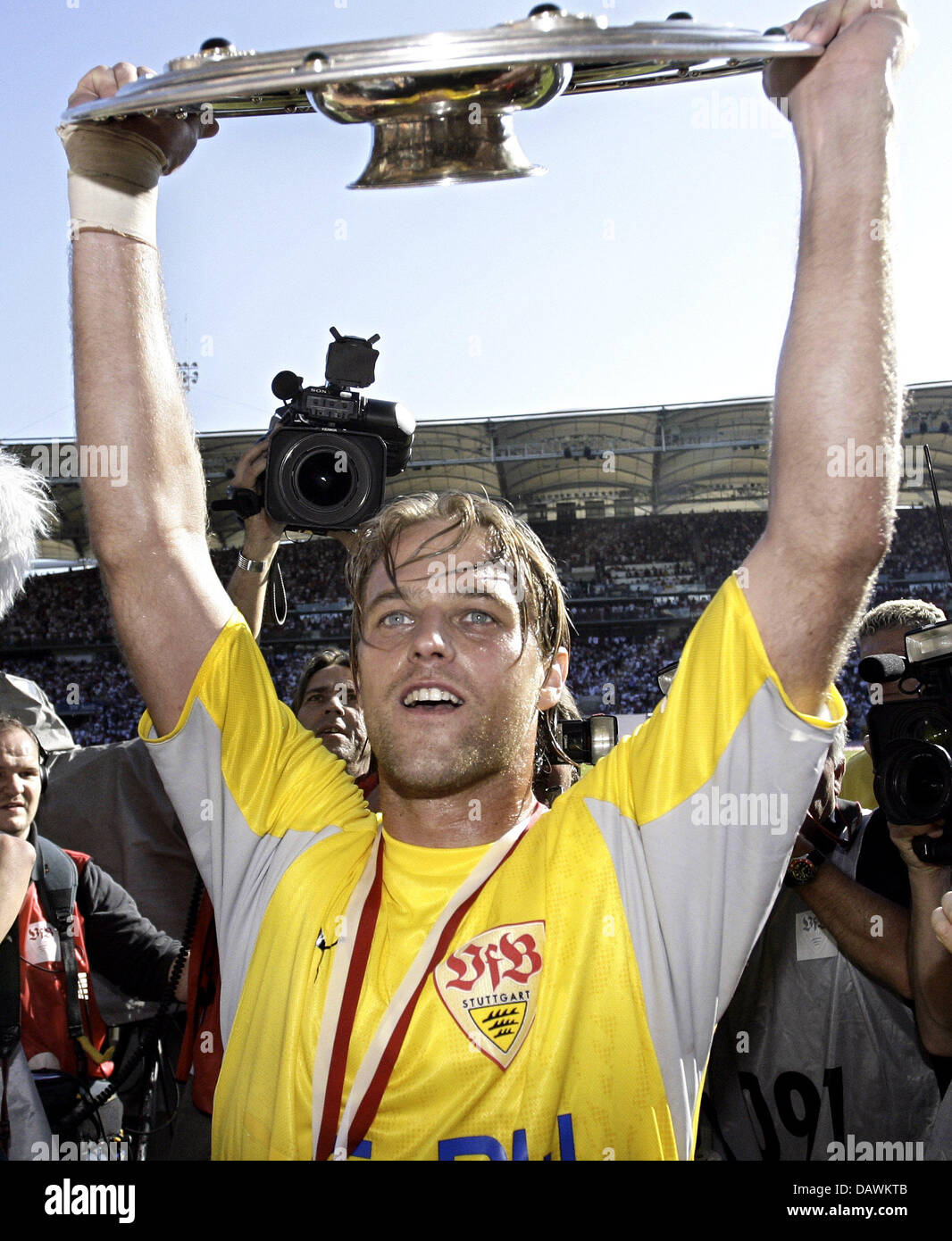 VfB Stuttgart goalkeeper Timo Hildebrand holds up the championship ...