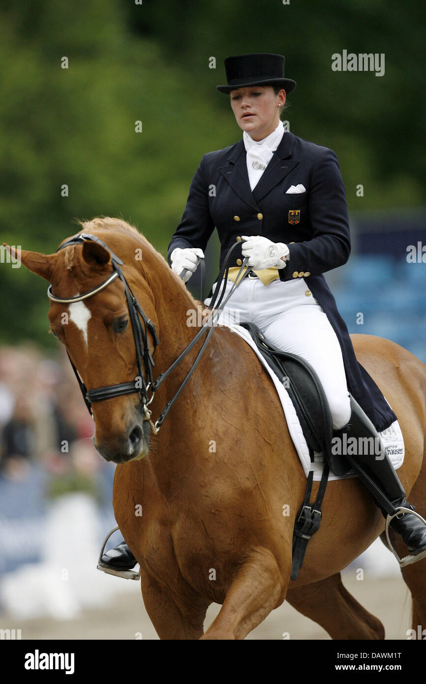 German equestrian Ellen Schulten-Baumer steers her horse 'Gina Royal ...