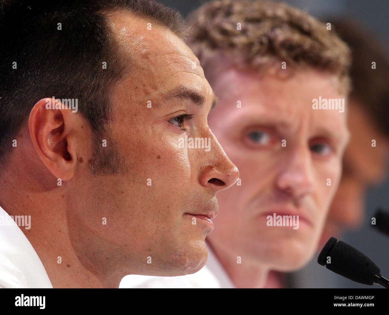 Former cycling pros of team T-Mobile Erik Zabel (front) and Ralf Aldag ...
