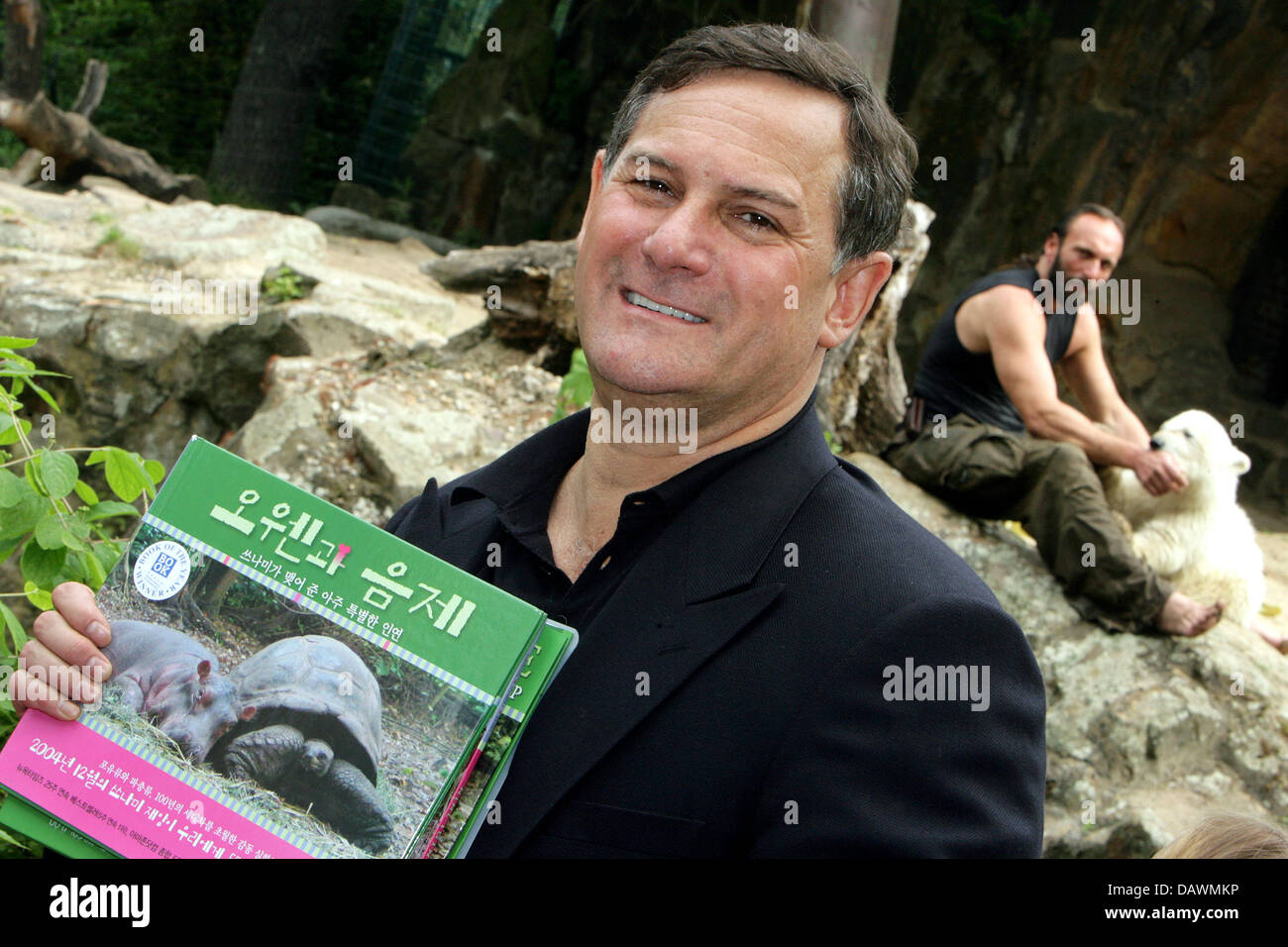 Craig Hatkoff (L), bestseller author from New York, poses with copies ...