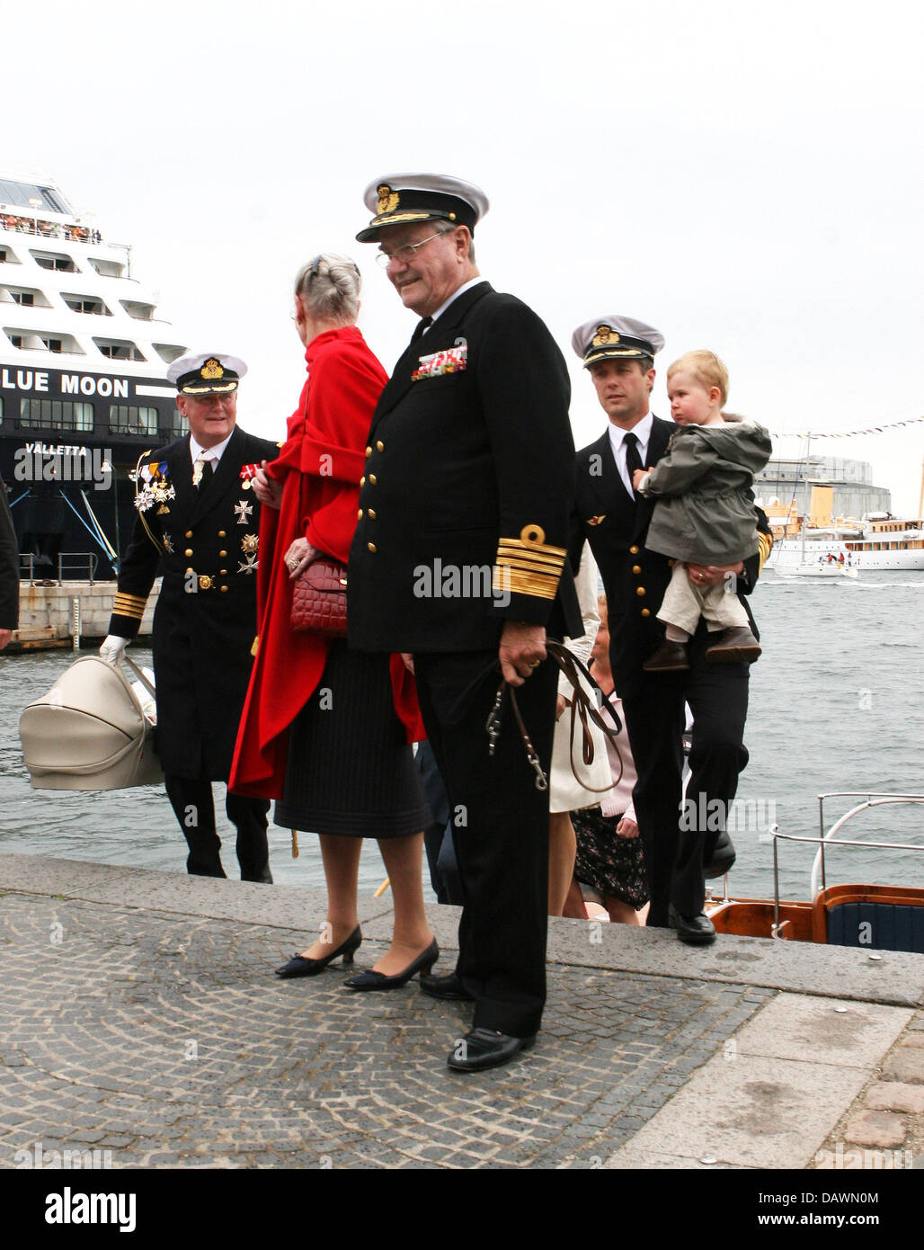(R-L) Little Prince Christian of Denmark on the arm of his father Crown ...