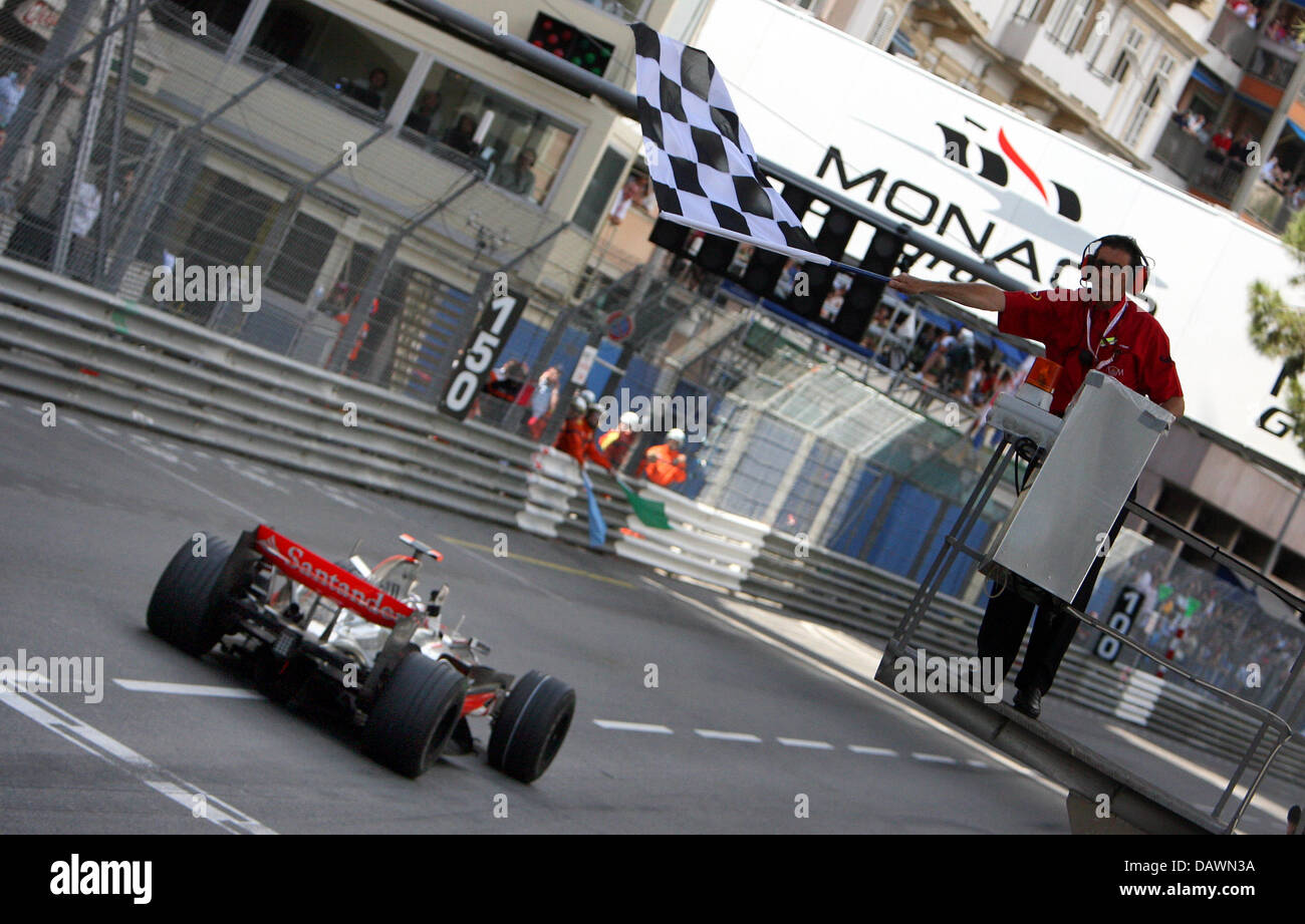 Spanish Formula One pilot Fernando Alonso of McLaren Mercedes passes ...