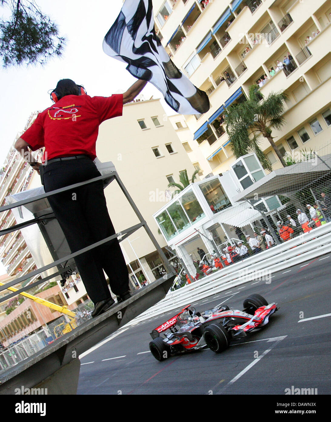 Spanish Formula One pilot Fernando Alonso of McLaren Mercedes passes ...