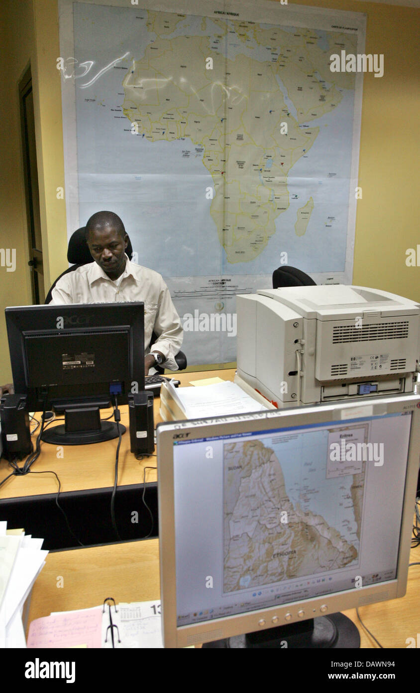 Staff members process reports from conflicts on the African continent ...