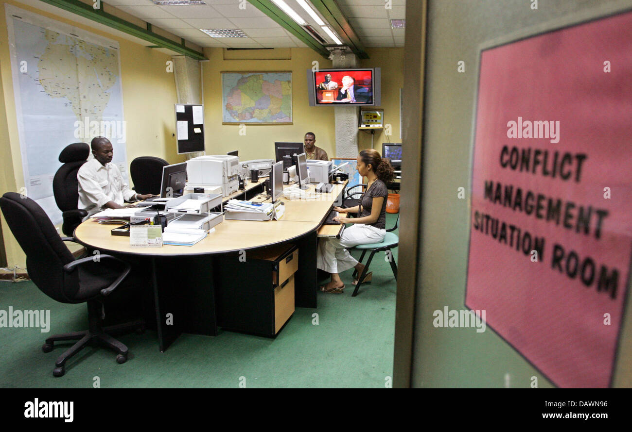Staff members process reports from conflicts on the African continent ...
